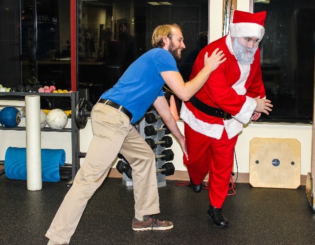 Stretches to Keep Santa Injury-Free on Christmas Eve - Athletico