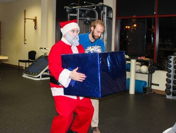 Stretches to Keep Santa Injury-Free on Christmas Eve - Athletico